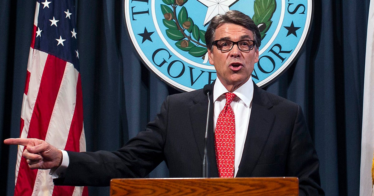 Rick Perry to turn himself in on abuse of power charges - CBS News