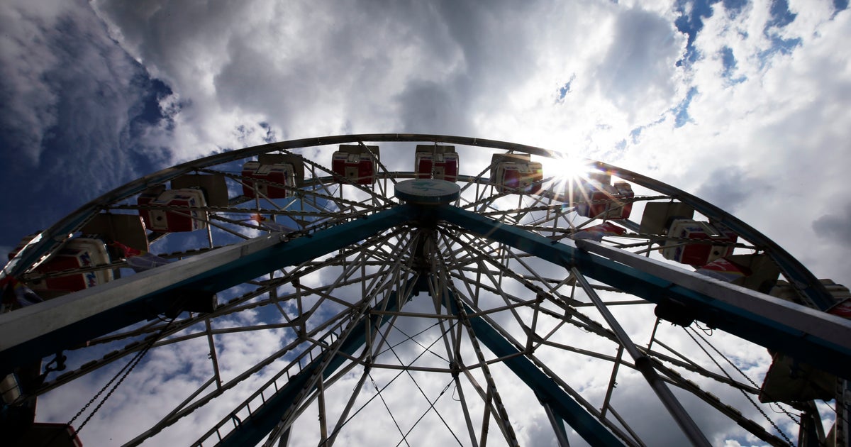 2 children injured in fall from Ferris wheel in Michigan - CBS News