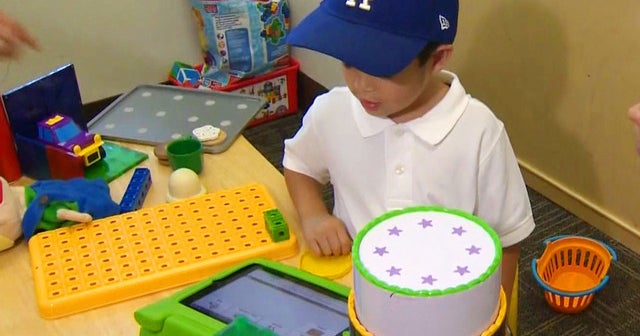 iPads improve language skills in autistic kids - CBS News