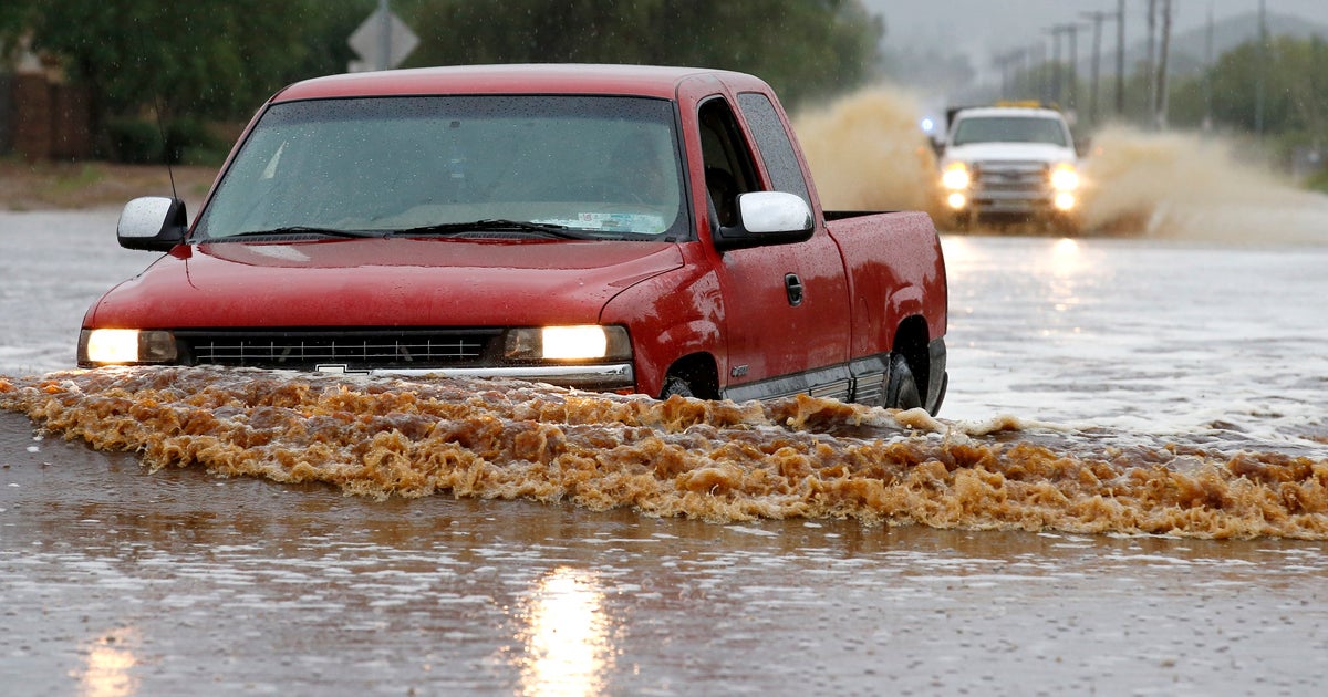 Arizona flash floods leave freeways closed, drivers stranded - CBS News