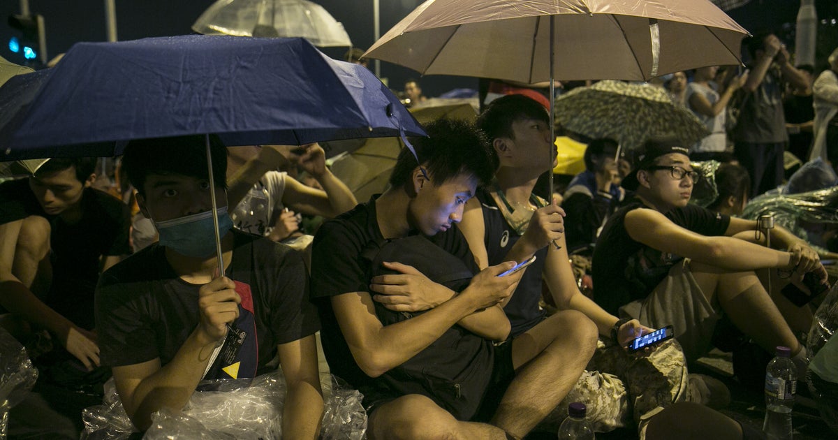 Hong Kong protests: China threatens "chaos" and "serious consequences ...
