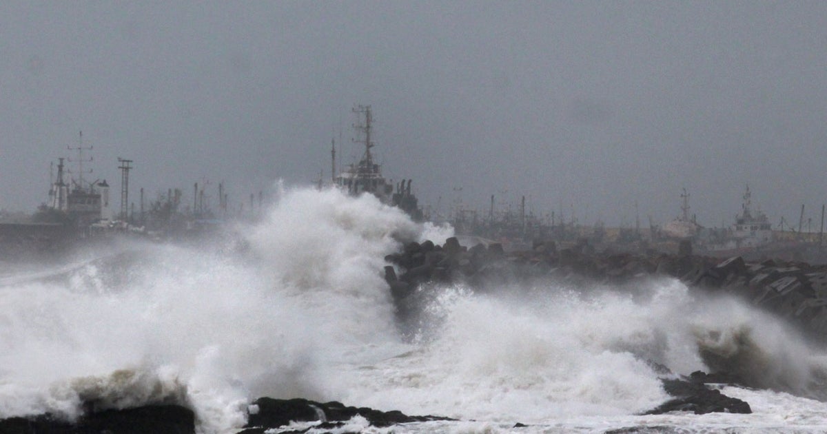 Massive storms slam millions in India and Japan - CBS News