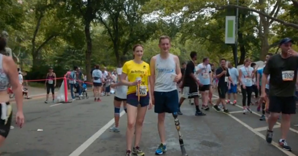 Disabled runners and volunteers team up for NYC Marathon - CBS News