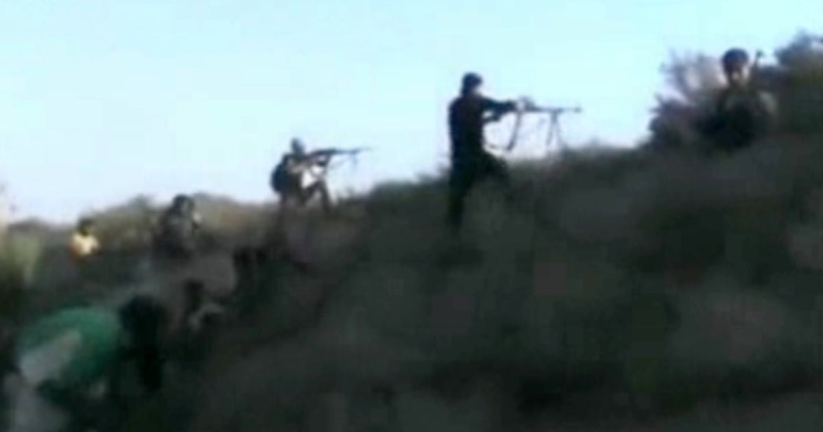 ISIS fighters capture village near key Syrian air base - CBS News