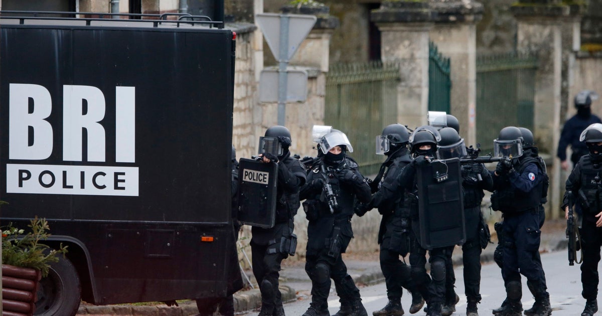 Paris shooting: Police swarm suburbs northeast of French capital in ...