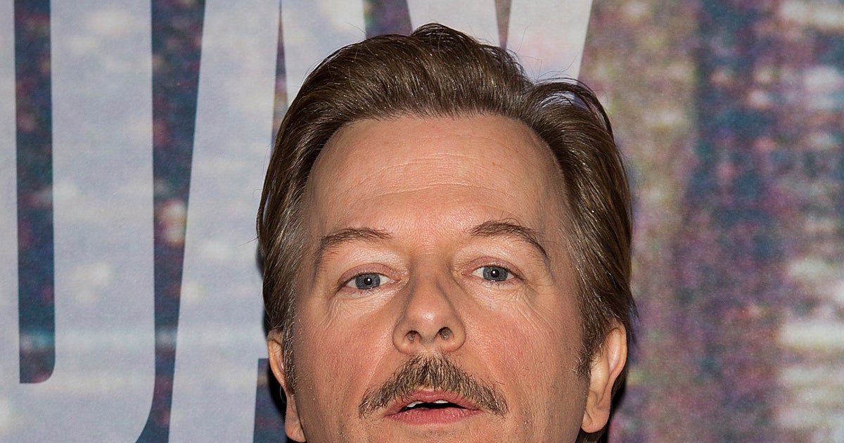 David Spade opens up on Eddie Murphy feud - CBS News