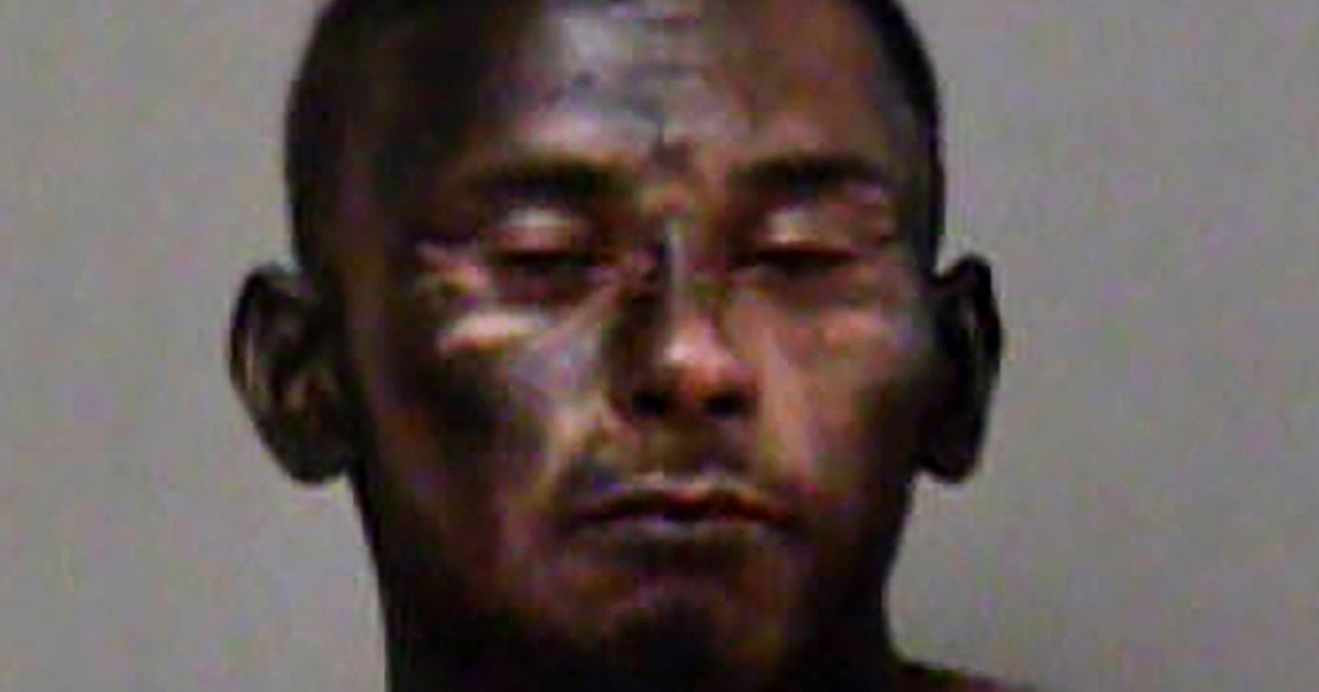 Police: Suspect spray-paints face to avoid identification - CBS News
