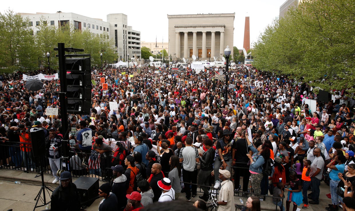 Baltimore rallies for justice, but also continues clean up - CBS News