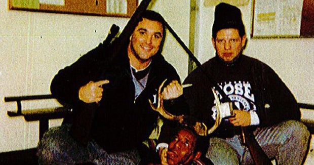 Chicago police officers shown in photo posing with rifles over black ...
