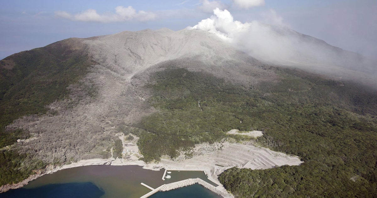 Volcano erupts in Japan, spewing ash miles high - CBS News