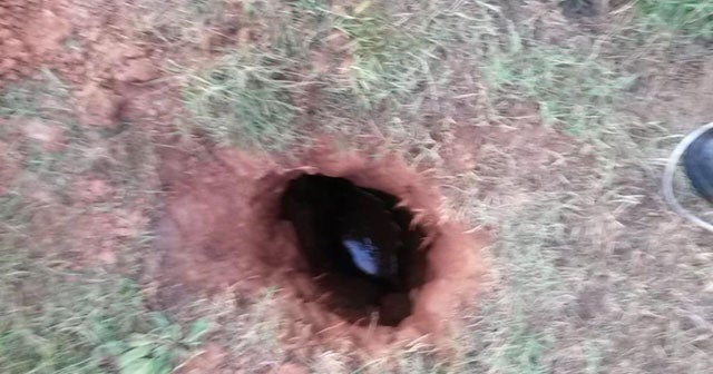 Man seriously hurt after falling into "deep hole" in Charlotte - CBS News