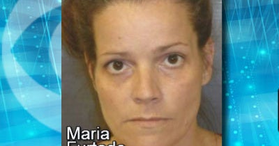 Mother accused of instructing son to shoot neighbor's puppy - CBS News