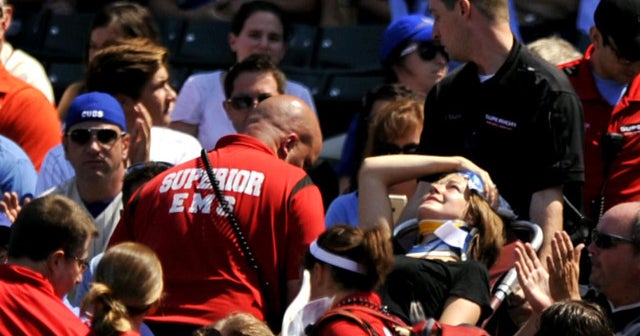 Fan struck by foul ball during Cubs game at Wrigley Field - CBS News