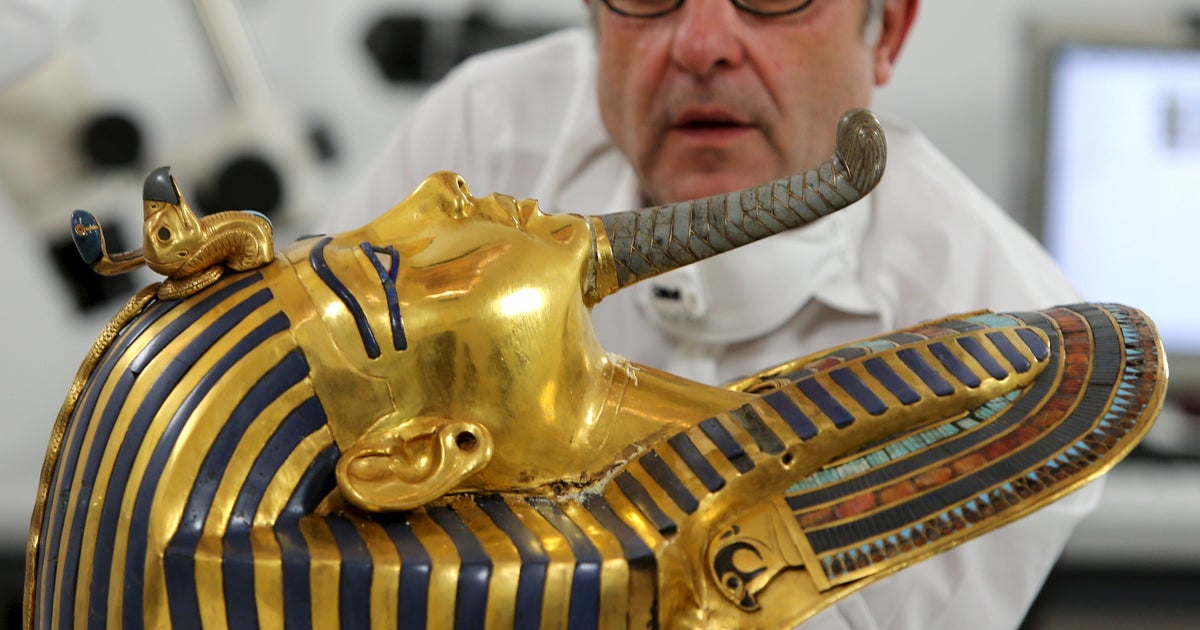 King Tut mask, broken beard restored, goes back on display - CBS News