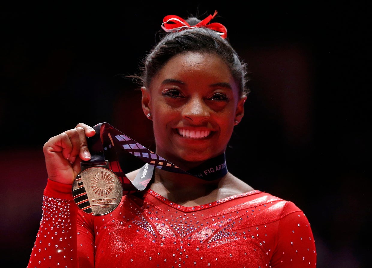 U S Gymnast Earns Record World Championship Gold Medals Cbs News