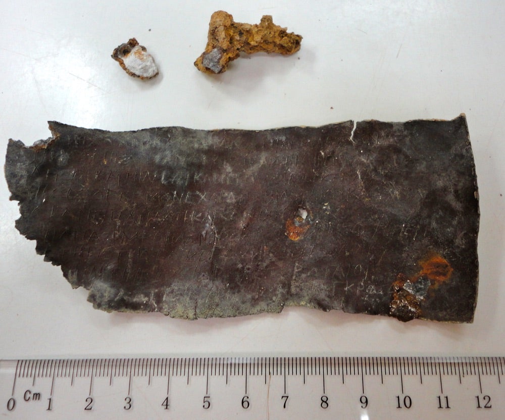 "Curse tablets" discovered in 2,400-year-old grave - CBS News