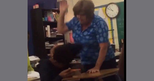 School board votes to fire Texas teacher shown hitting student - CBS News