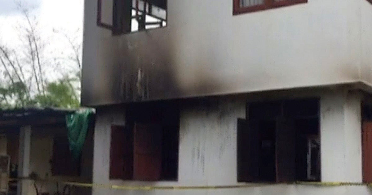 Thai dorm fire kills 18 girls who thought it was a prank - CBS News