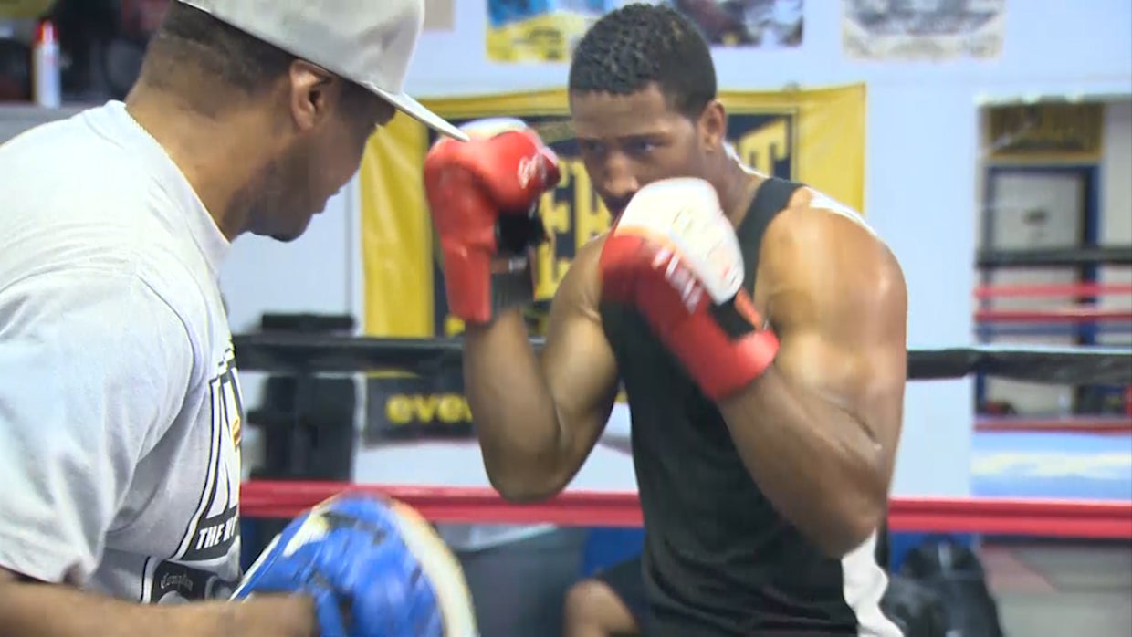 Study looks at what boxing, MMA fighting may do to the brain - CBS News