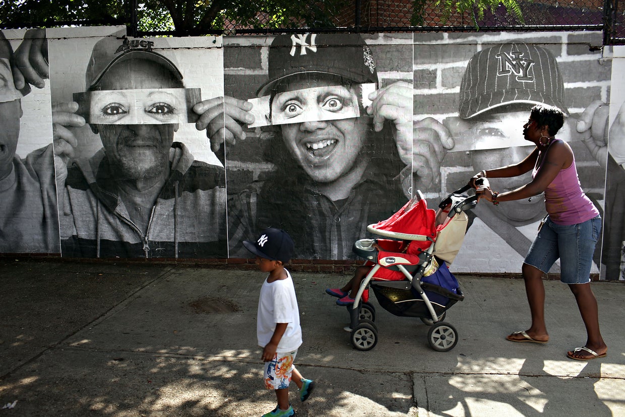 French street artist JR makes the Louvre Pyramid disappear