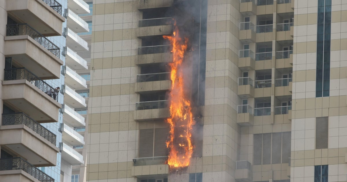 Dubai skyscraper fire extinguished after flames char 30 stories in ...