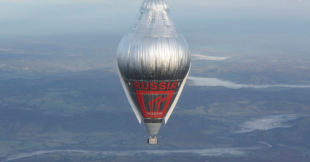 Balloonist makes record round-the-world solo flight - CBS News