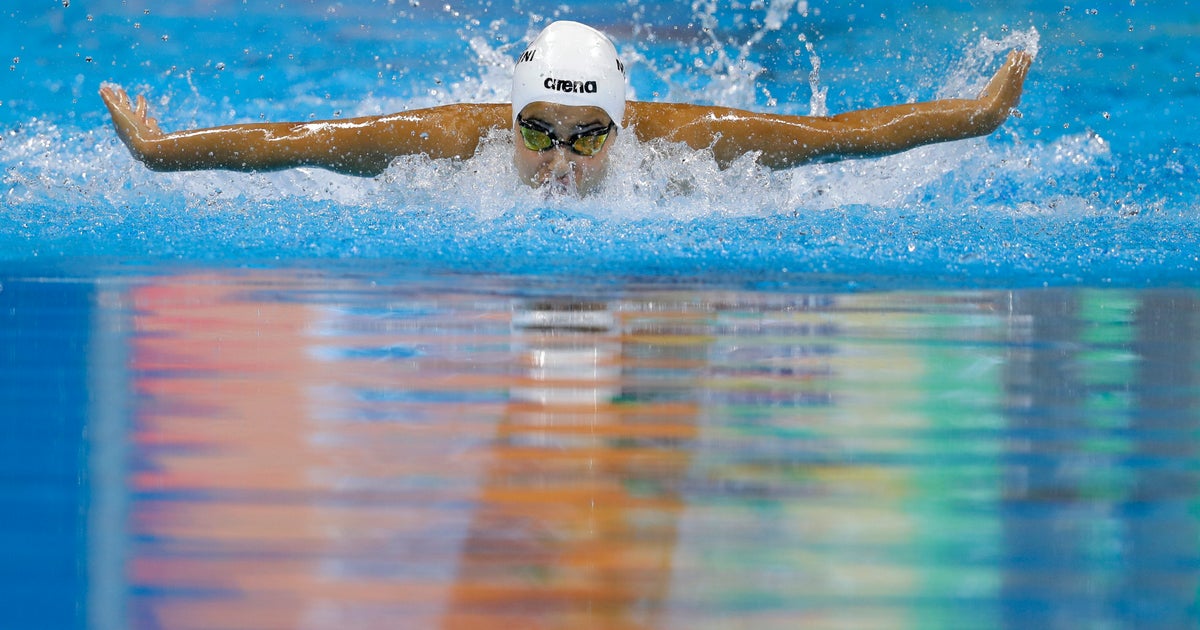 Refugee swimmer Yusra Mardini makes history in Olympic pool - CBS News