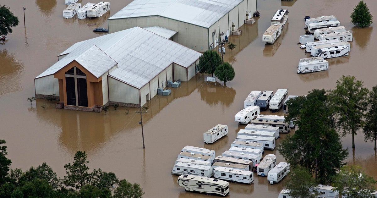 Louisiana governor on unprecedented flooding: "It is not over" - CBS News