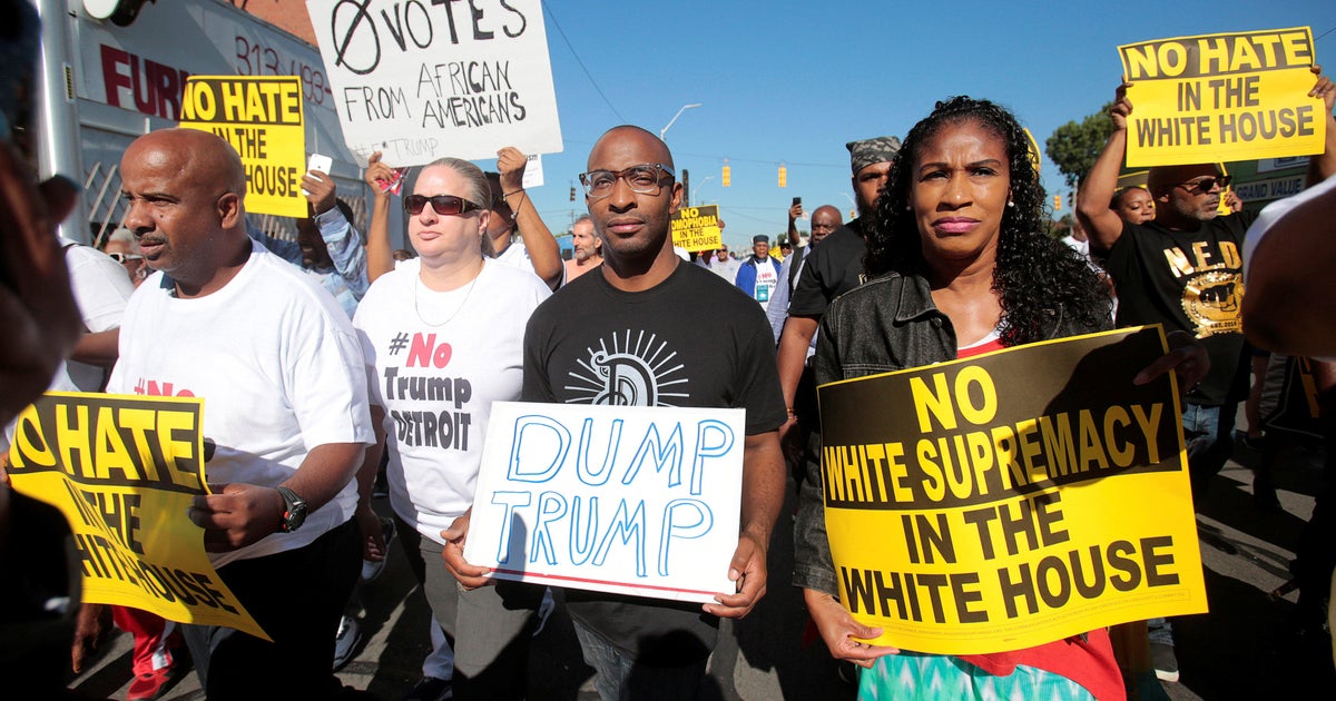 Angry protesters rally around church during Trump's Detroit visit - CBS ...