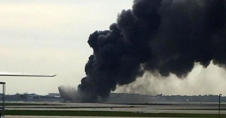 Fire breaks out on plane at Chicago airport - CBS News