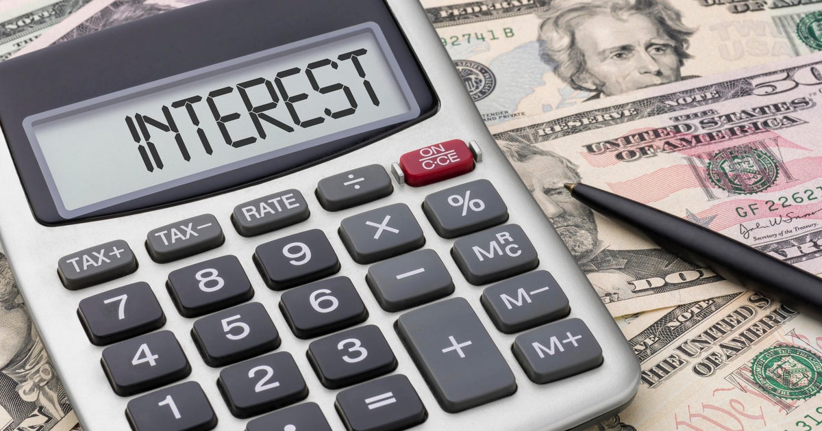 Fed stands pat on interest rates, but hints at upcoming hike - CBS News