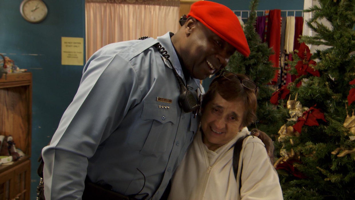 Elves in blue help Secret Santa spread holiday green - CBS News