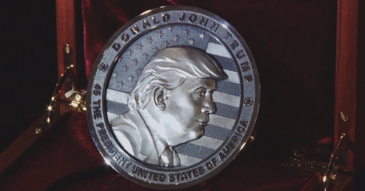 Russia company minting Donald Trump coins declaring "In Trump we trust ...