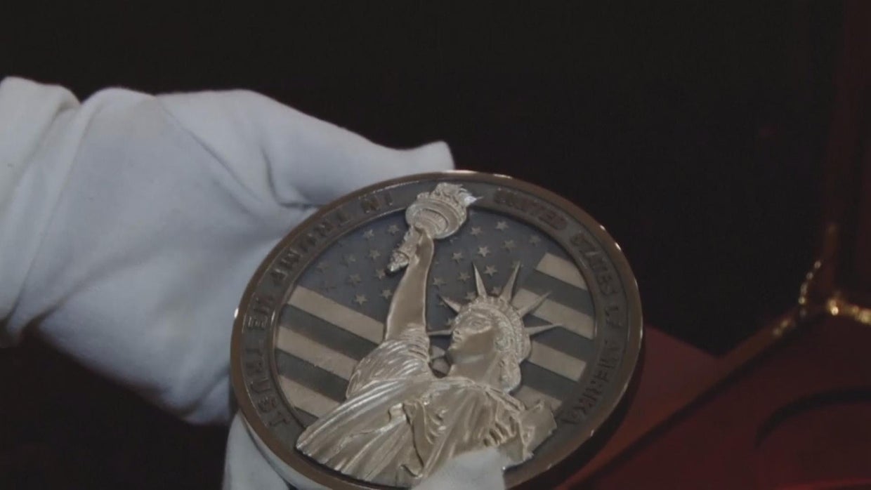 Russia company minting Donald Trump coins declaring "In Trump we trust ...