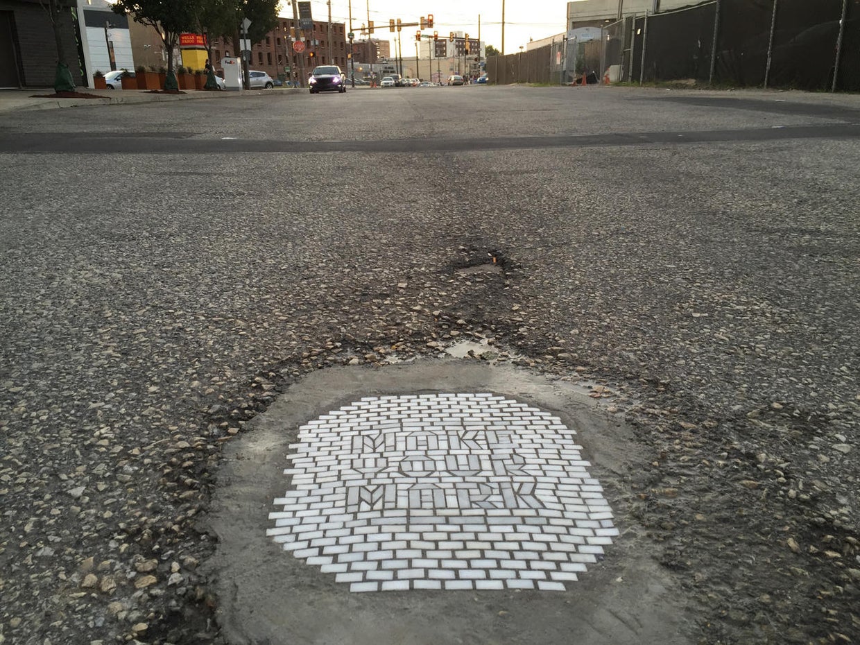 Street art: Jim Bachor's pothole mosaics
