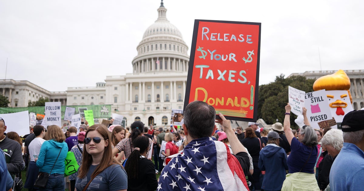 "Tax March" protests demand release of Trump's tax returns - CBS News