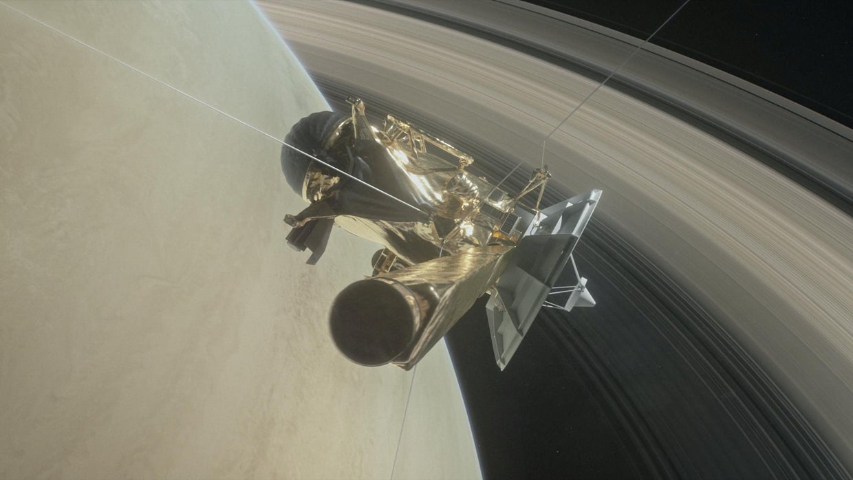 NASA’s Cassini Saturn probe flies between Saturn and its rings - CBS News