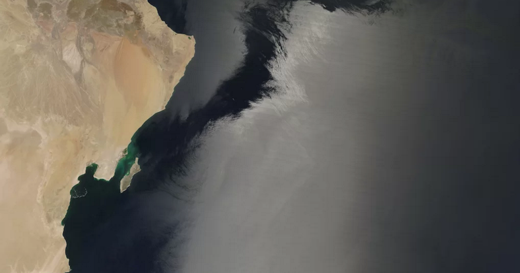 NASA satellite photo shows eerie dark streak across Arabian Sea - CBS News