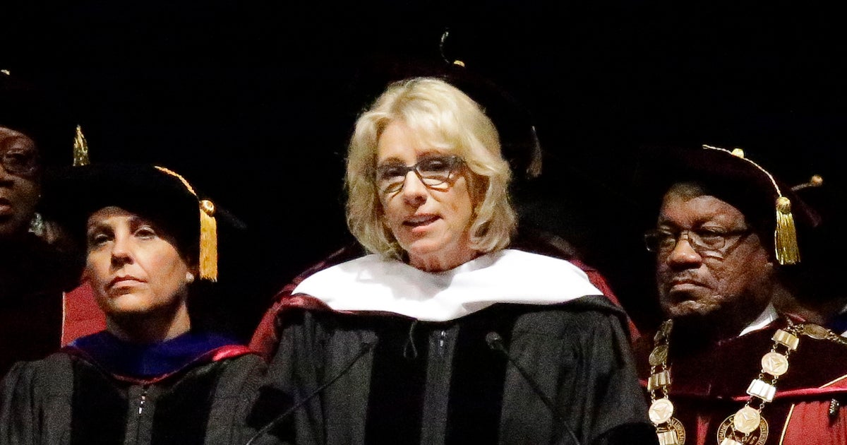 Betsy DeVos met with audible boos at Bethune-Cookman graduation - CBS News
