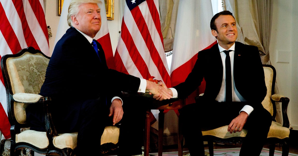 Macron says long handshake with Trump was "not innocent" - CBS News