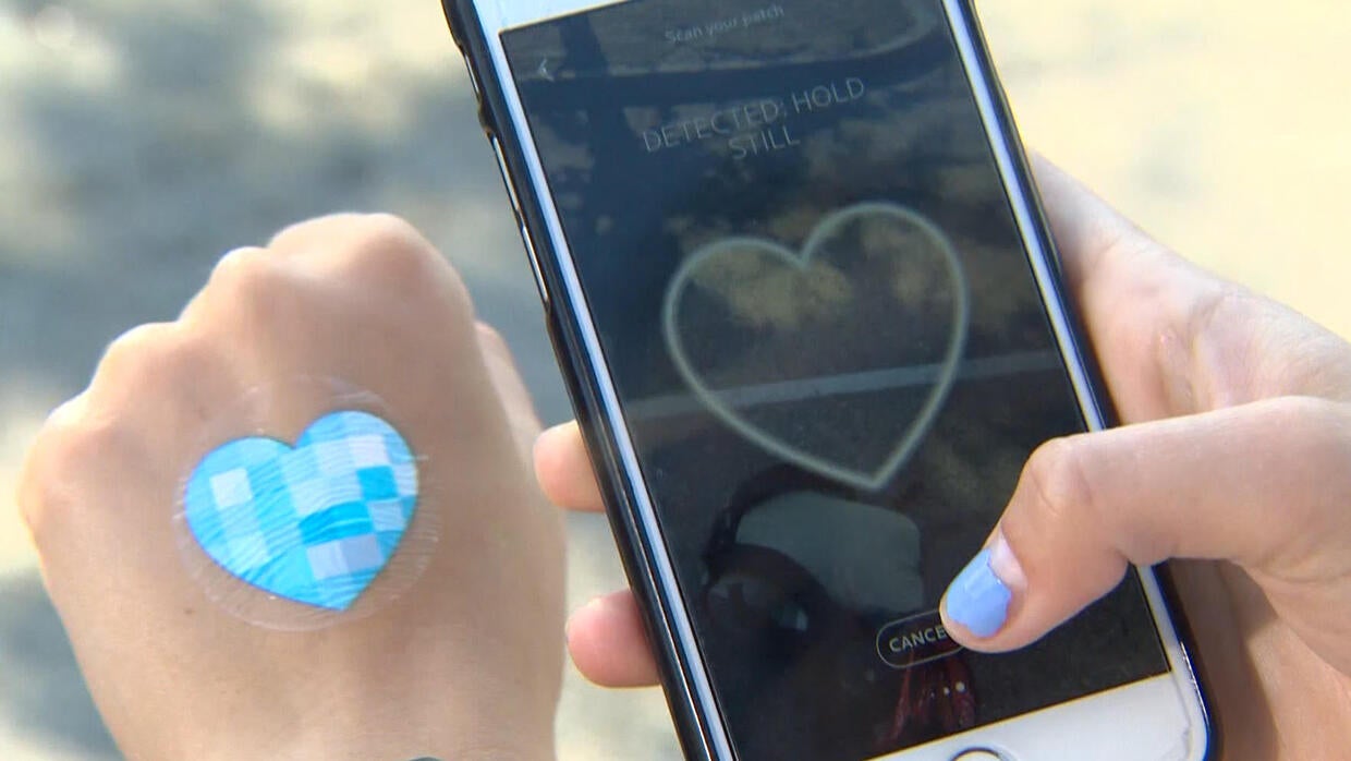 High-tech wearable UV patch aims to improve sun safety - CBS News