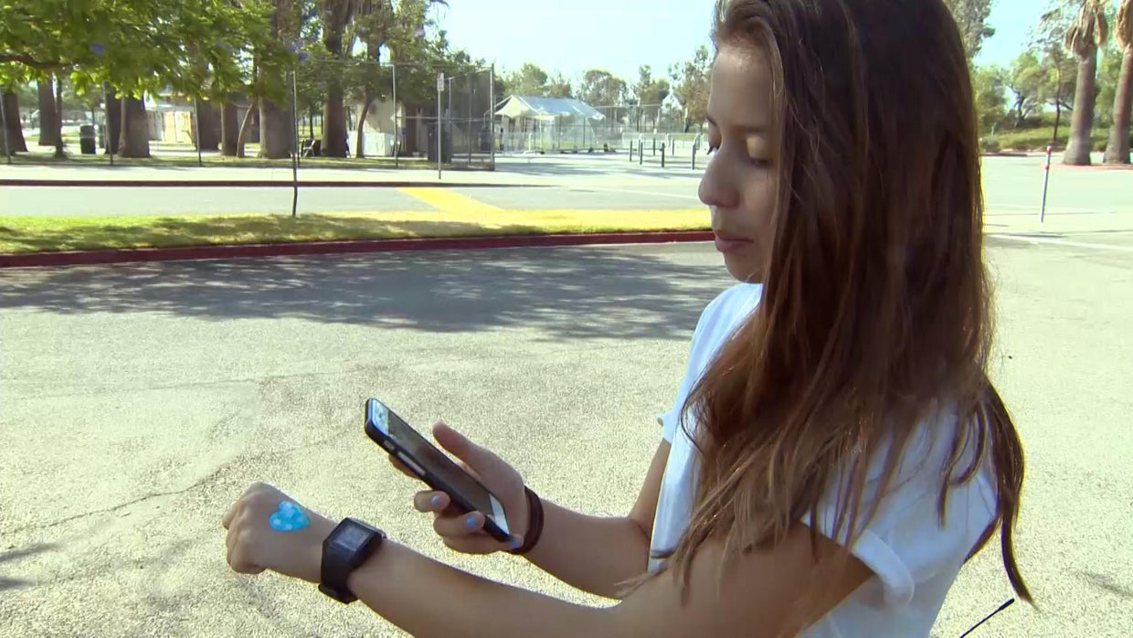 High-tech wearable UV patch aims to improve sun safety - CBS News