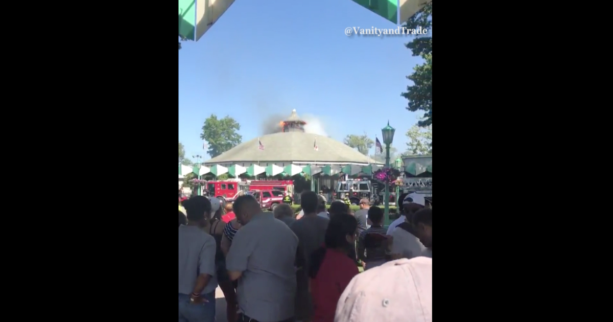 Carousel roof catches fire at New York amusement park - CBS News