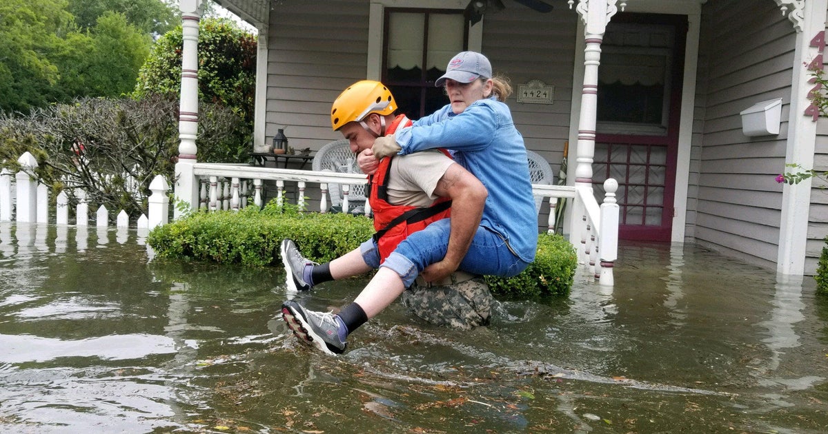 Thousands flee homes as catastrophic flooding hits Houston - CBS News