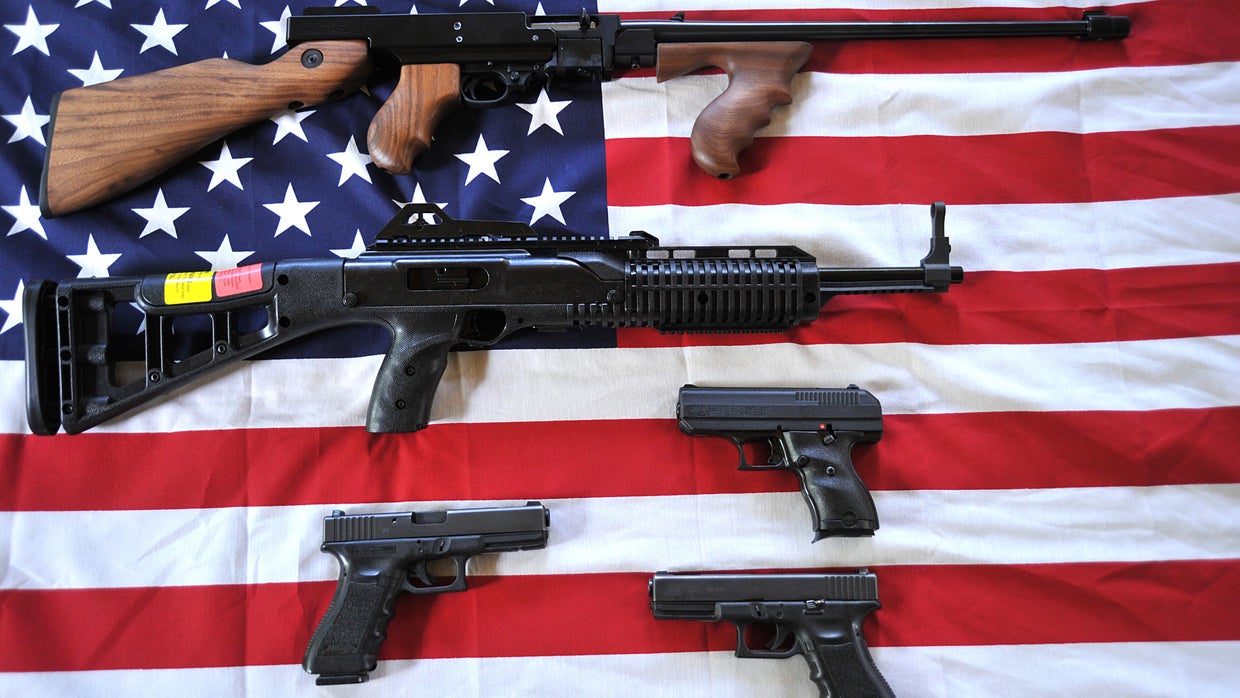 Woman's gun-toting "graduation photo" sparks backlash online - CBS News