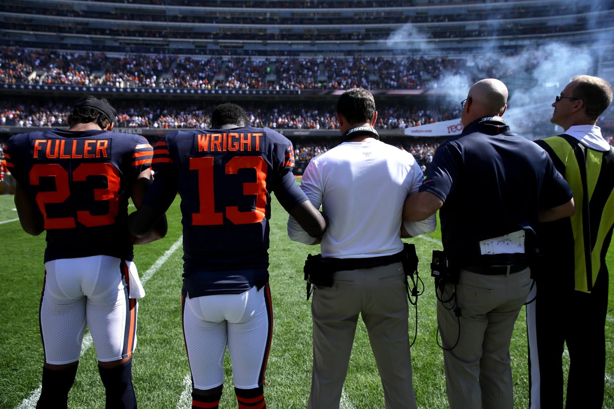 NFL players kneel, raise fists, lock arms during national anthem - CBS News