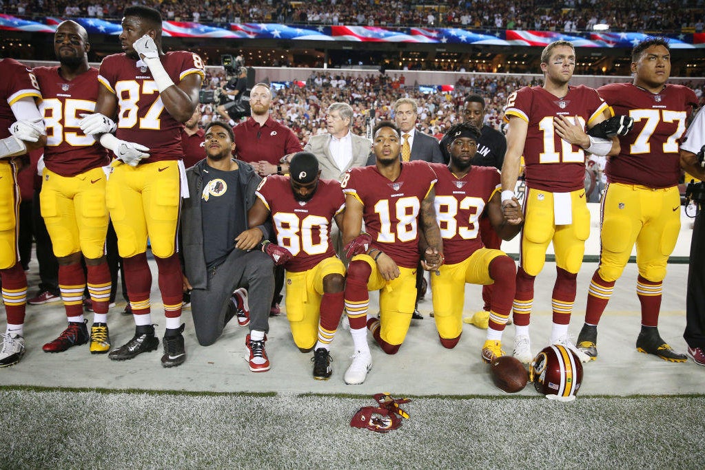 NFL players kneel, raise fists, lock arms during national anthem - CBS News