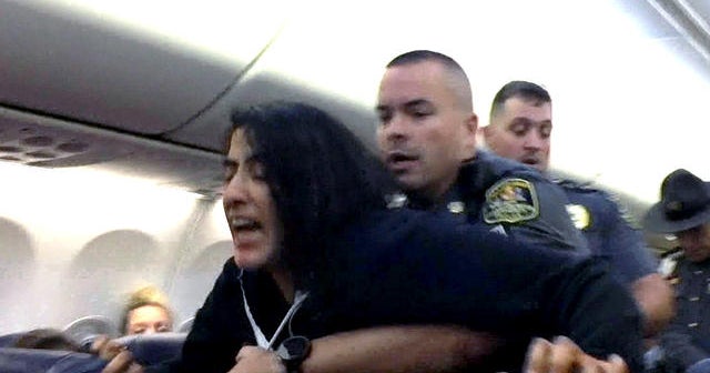 Video Shows Woman Being Forcibly Removed From Southwest Flight Cbs News