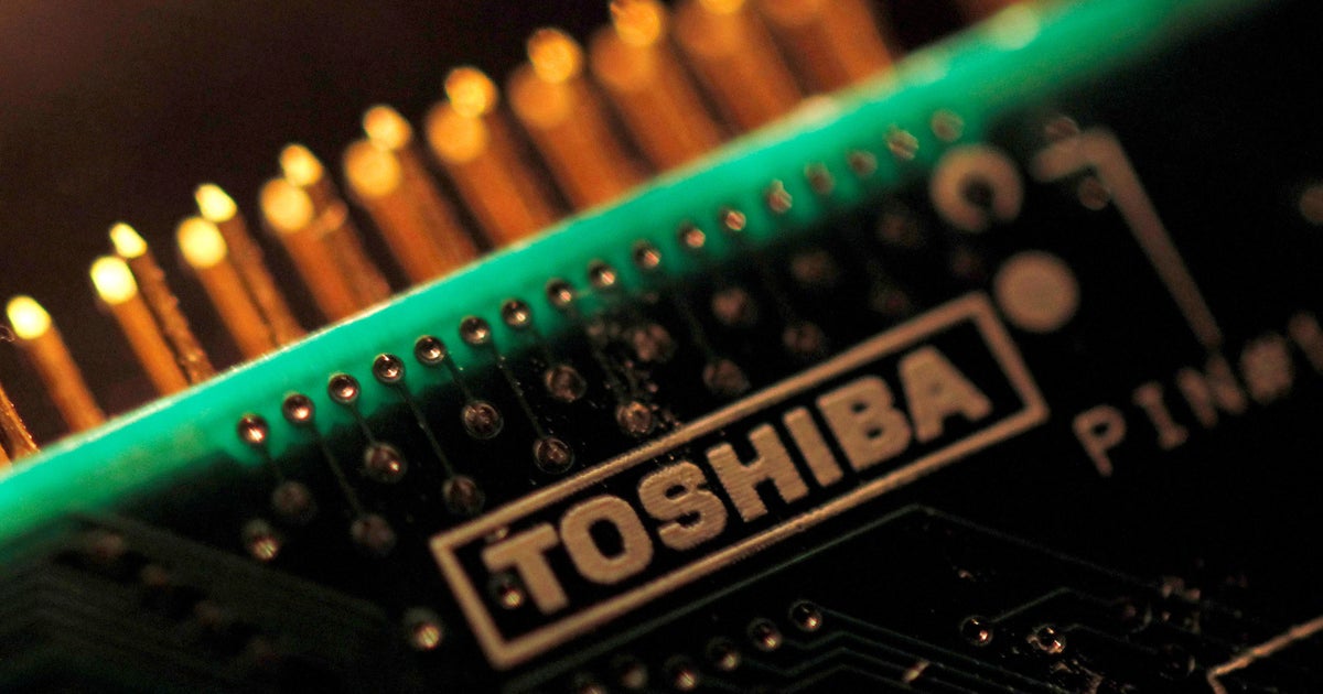 Troubled Toshiba, Bain sign $18 billion sale of chip unit - CBS News