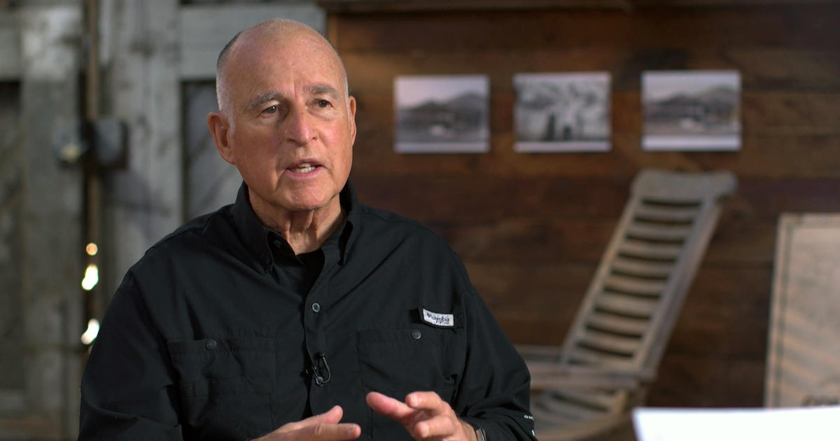 The governor who's castigating the president on climate change - CBS News